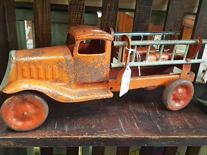 This weathered toy truck has more character in its rust than most modern toys have in their entire existence.
