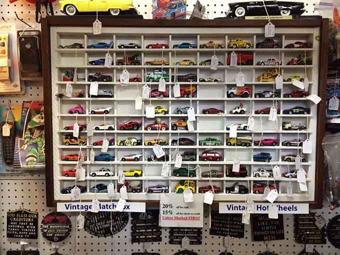 Rows of vintage Matchbox and Hot Wheels cars, tiny vehicles with enormous power to trigger childhood memories.