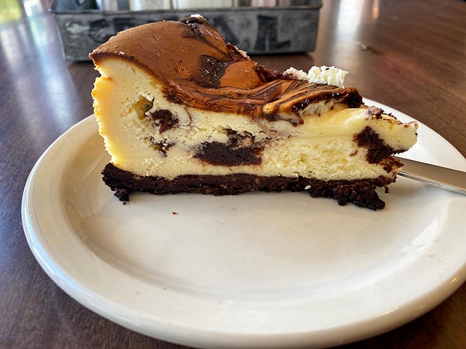 That chocolate swirl cheesecake on an Oreo crust is the kind of dessert that makes you forget what day it is.