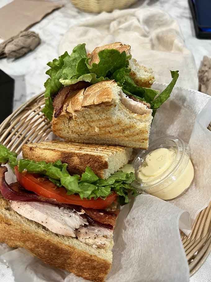 A chicken club sandwich so stacked and golden, it makes you briefly reconsider your loyalty to the donut.