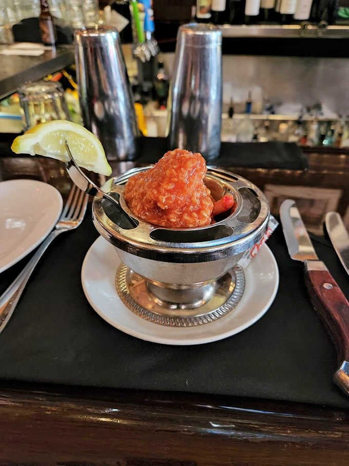 The World Famous Shrimp Cocktail arrives looking innocent, but that horseradish sauce has a personality all its own.