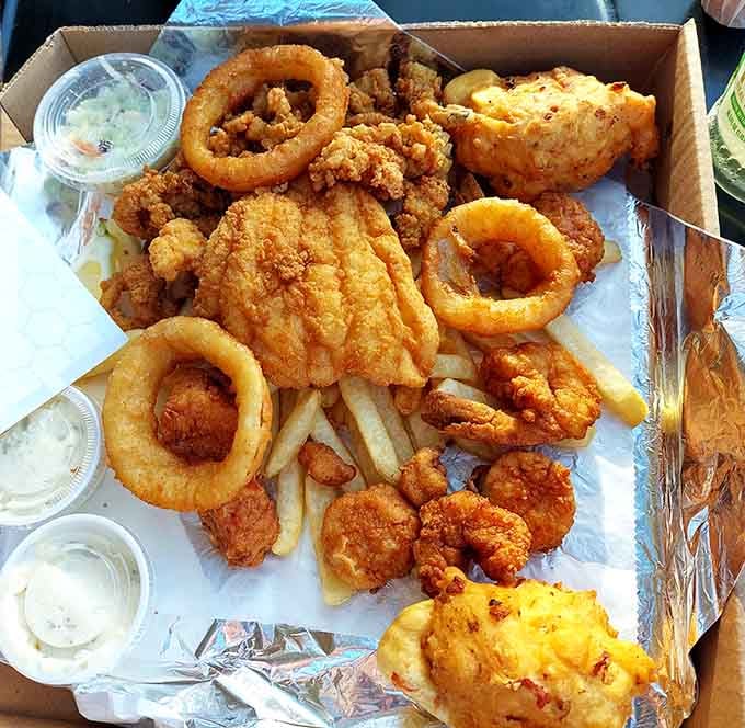 The Star Seafood Platter arrives like a greatest hits album, haddock, clams, shrimp, onion rings, and fries all at once.