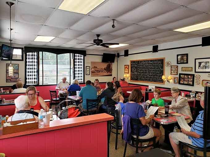 A full dining room of happy people. This is what a beloved community gathering spot actually looks like.