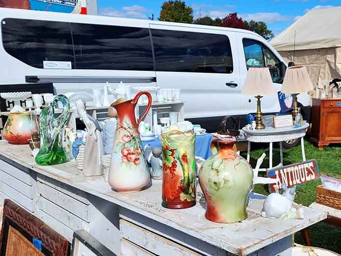 Hand-painted pitchers and ceramic vases lined up like old friends, each one telling a story without saying a word.