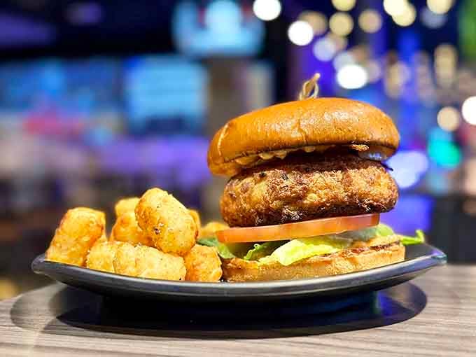 A crispy, golden sandwich with tater tots on the side &mdash; comfort food that means serious business.