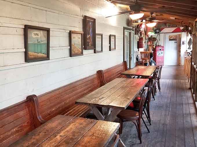 Long wooden tables, framed coastal art, and the kind of unhurried atmosphere that makes lunch feel like a vacation.