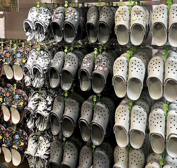 A wall of Crocs in every shade, bold, cheerful, and completely unapologetic about it.