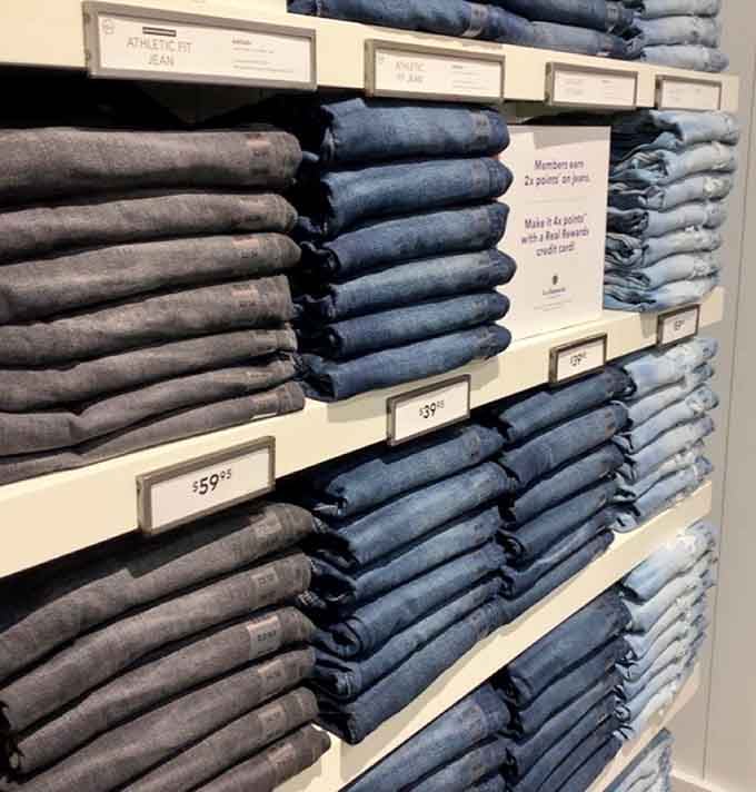 Denim stacked like a blue jean library, waiting to find the perfect fit for every body type.