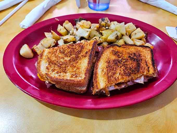 Grilled sandwiches and crispy potatoes proving that lunch here is no consolation prize either.
