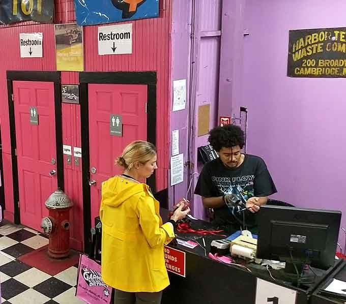 That bright yellow raincoat proves even checkout counters here are more stylish than most people's entire wardrobes combined.