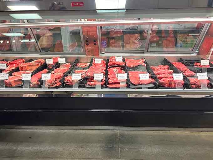 A butcher case packed with fresh cuts that would make any backyard grill master stop and stare with pure admiration.