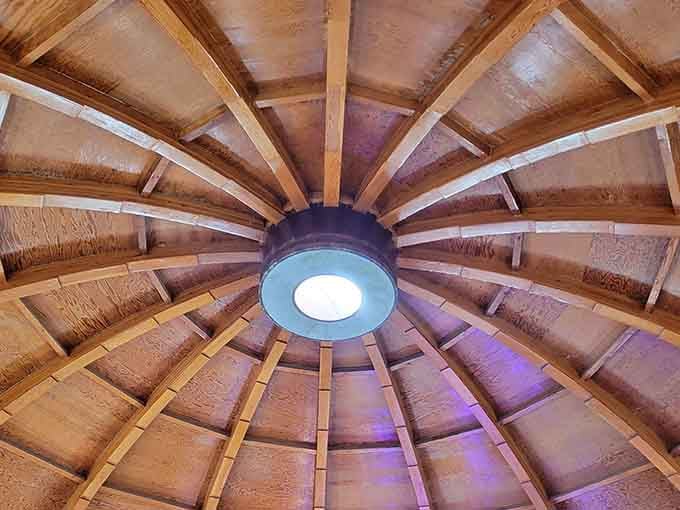 Look straight up inside the dome and you'll see wooden beams radiating outward like a mandala built by a very ambitious engineer.