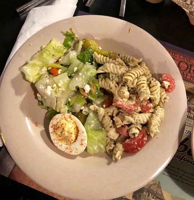 Pasta salad with deviled eggs proves even the sides get star treatment at this buffet wonderland.