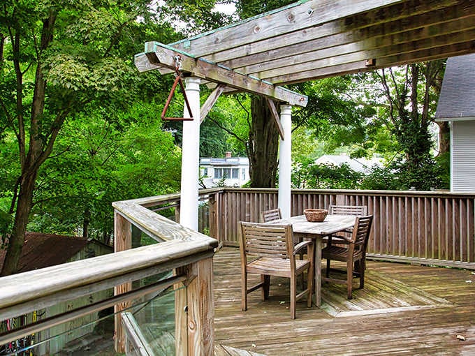 Breakfast on this pergola deck with treetop views? That's not a vacation, that's a personality upgrade.