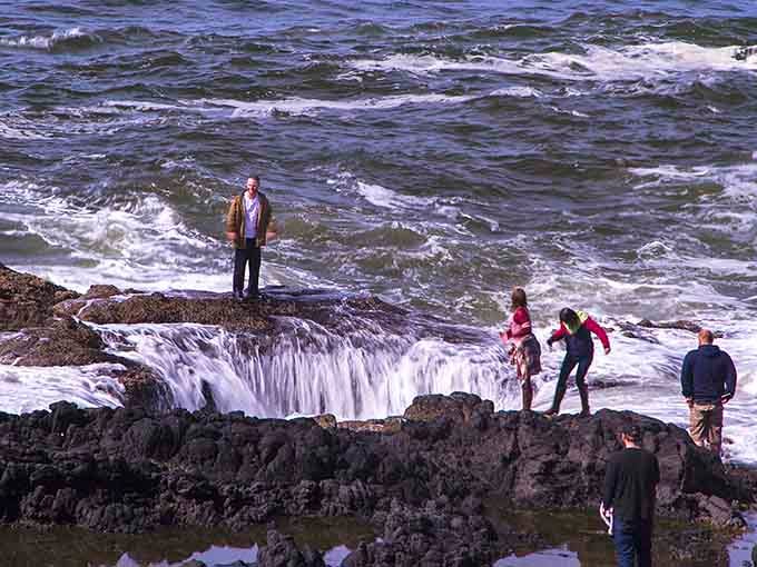Brave souls getting their money shot while the Pacific plots its next surprise wave attack.