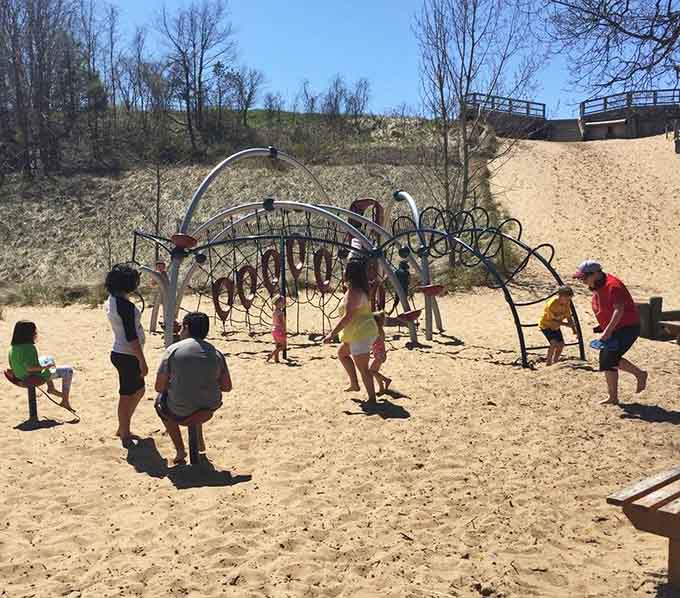 Families discovering that climbing structures are infinitely more entertaining when surrounded by forgiving sand dunes.