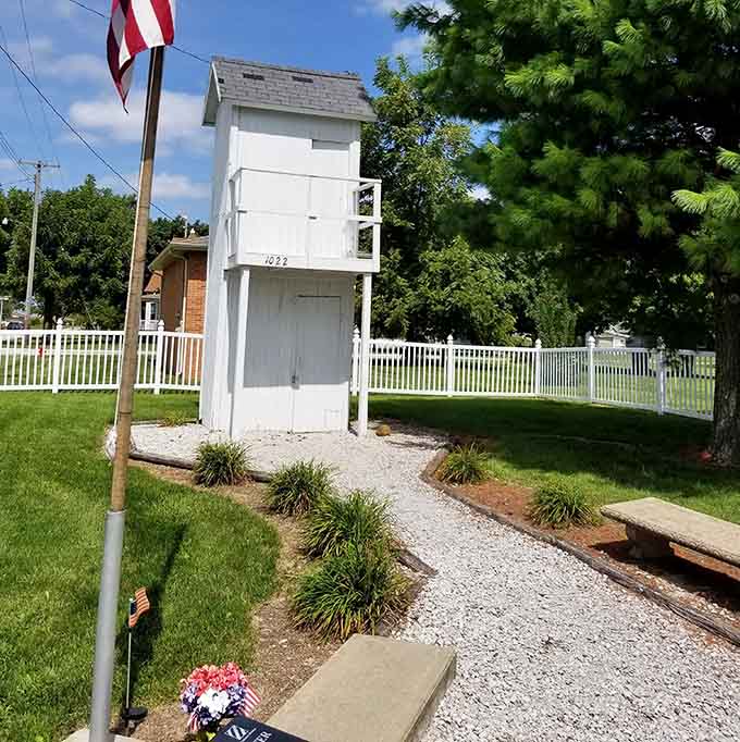 Stone benches, a gravel path, and a historic outhouse. Gene Goodwin Park is unexpectedly charming and peaceful.