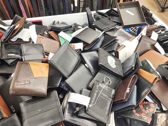 A glorious pile of wallets, each one a tiny mystery novel with no last chapter written yet.