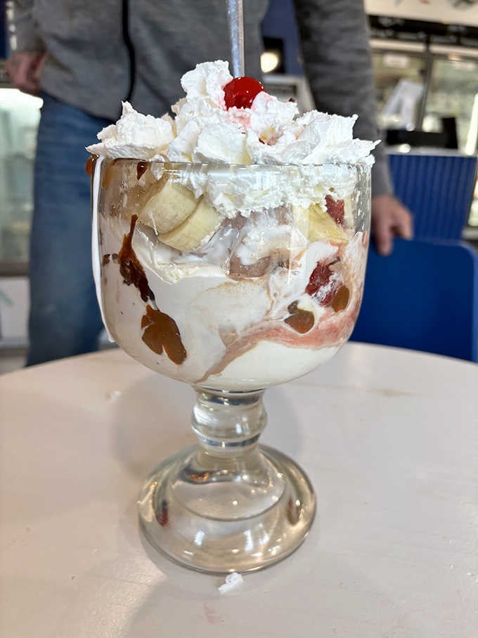 A banana split so generously loaded, it arrives looking like a celebration you didn't know you needed.