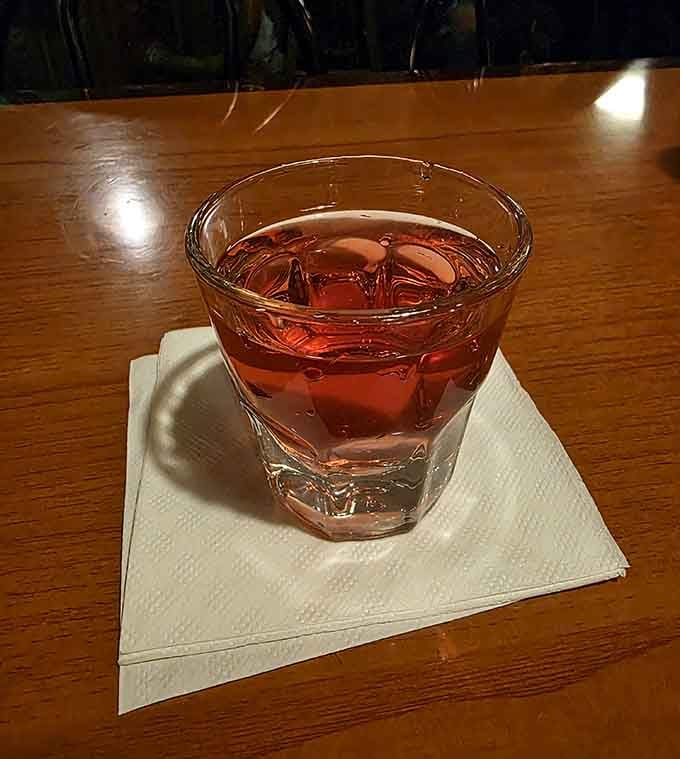 A well-poured cocktail on a napkin, the bar at Wag's takes its drinks as seriously as its burgers.