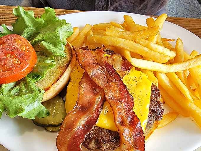 A bacon cheeseburger and fries that look like they mean serious business. Wisconsin does not mess around with lunch.