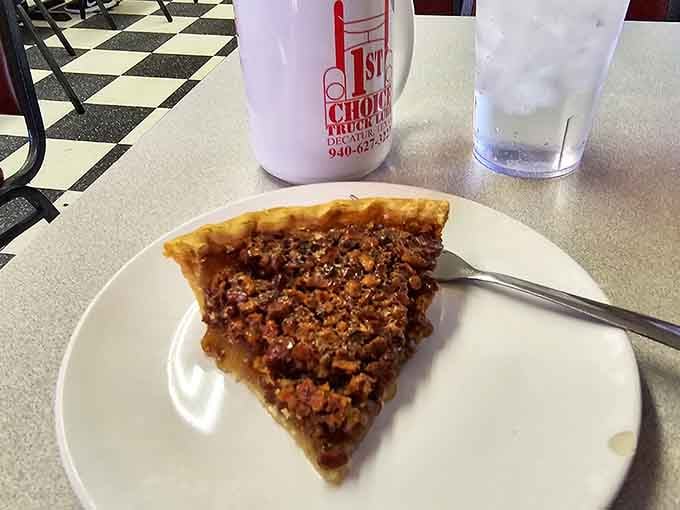 Pecan pie with a flaky crust that looks like someone's grandmother made it with actual love and real ingredients.