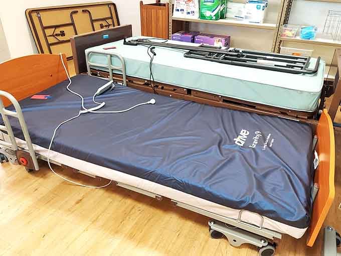 Hospital beds and medical equipment available, proving this store truly serves every community need imaginable.
