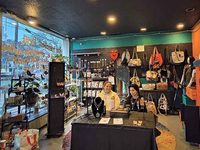 Friendly faces behind the counter, surrounded by bags, jewelry, and good energy. This is what a welcoming shop looks like.