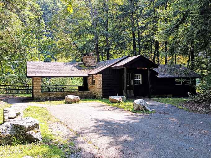 This cozy stone and timber cabin says "roughing it" in the most comfortable, charming way possible.