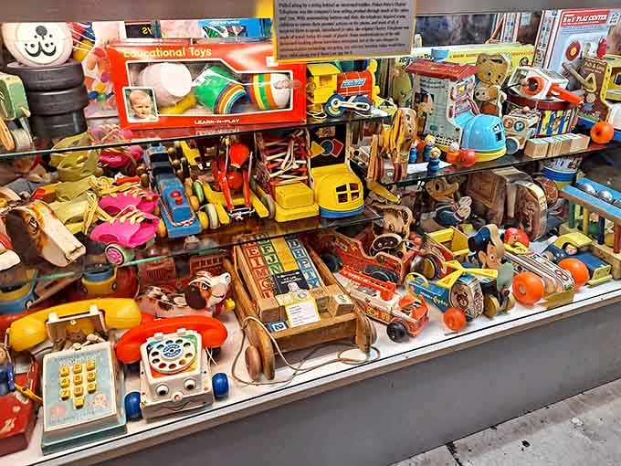 Wooden pull toys, Fisher-Price classics, and tin vehicles packed together like a greatest hits album of American childhood.