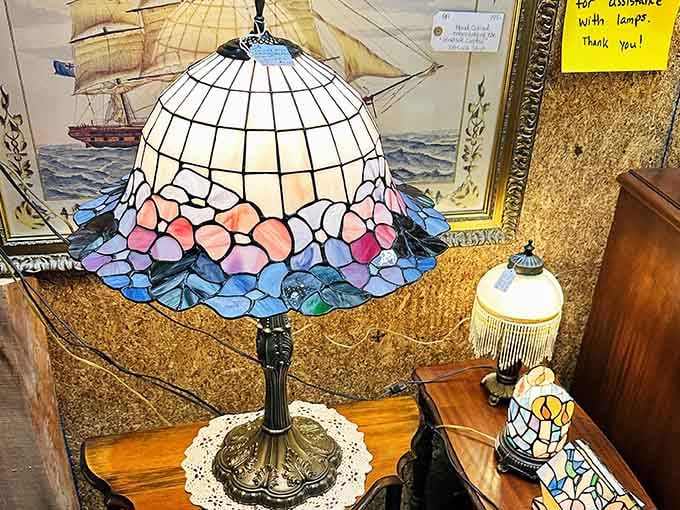 That stained glass lamp isn't just a lamp, it's the kind of thing you buy and then rearrange your entire living room around.