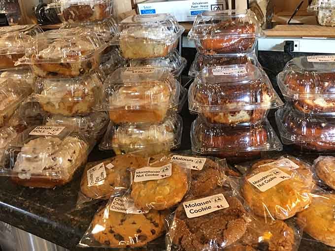 Rows of fresh-baked pastries and cookies lined up like a delicious army, each one quietly demanding your full attention.