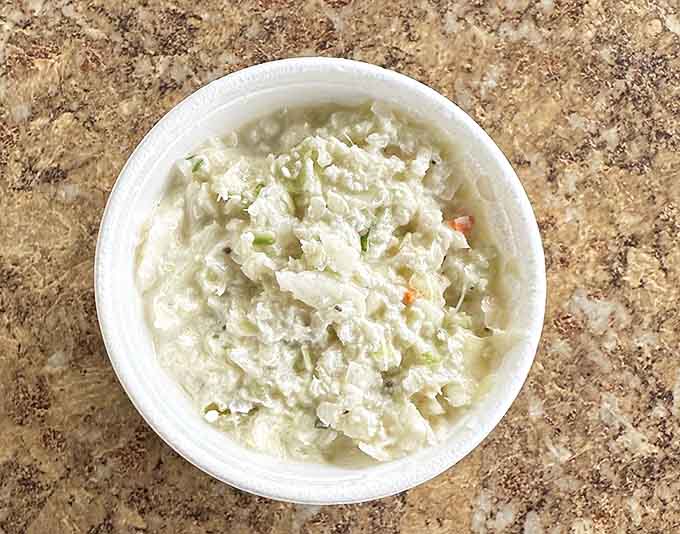 Creamy, cool coleslaw that earns its spot on the plate without asking for any credit whatsoever.