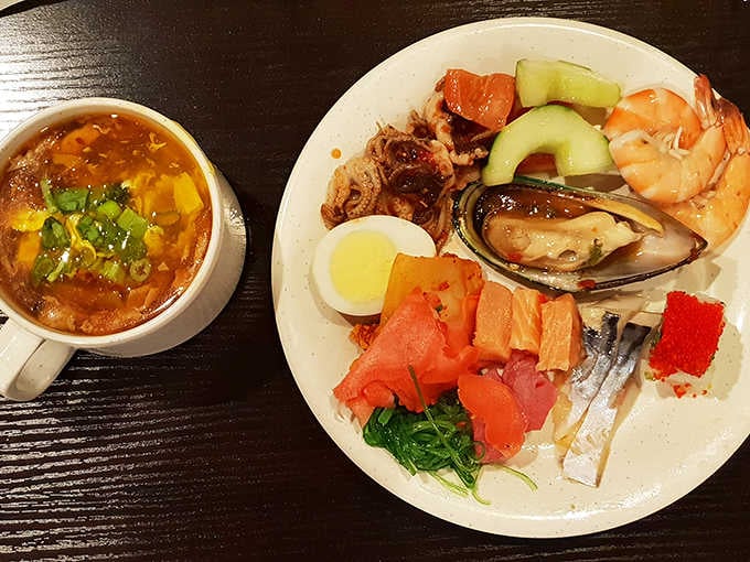 Shrimp, mussels, squid, salmon, and a bold bowl of soup. Sunday seafood mode is fully activated here.