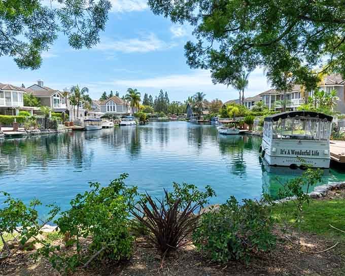 A boat named "It's A Wonderful Life" floating on a sparkling lake. Yorba Linda didn't even try to be subtle about it, and we respect that.