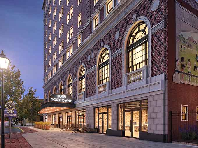 Hotel Yorktowne's grand facade whispers old-world elegance while quietly promising every modern comfort you'd ever want.