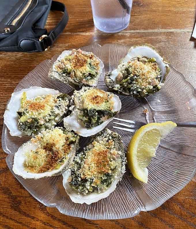 Rockefeller oysters wearing their spinach and breadcrumb tuxedos, ready for the fanciest party in your mouth right now.