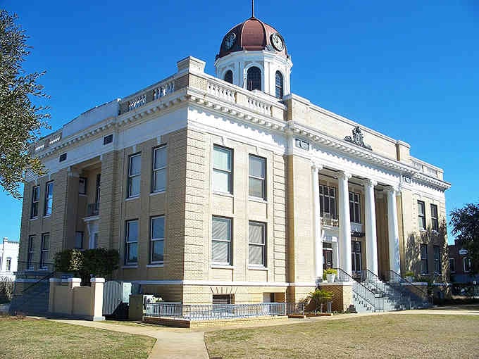 The courthouse dome catches sunlight like a beacon, crowning this beautiful building that's served the community for generations.