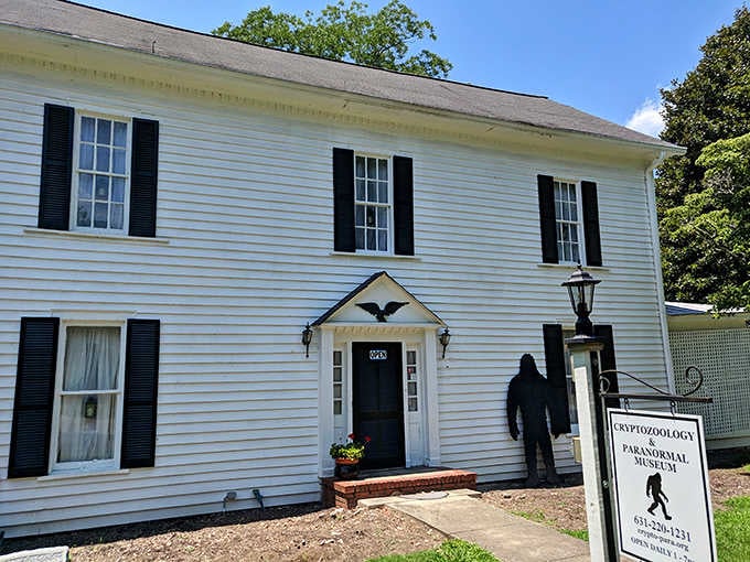 A life-sized Bigfoot silhouette stands guard outside this perfectly ordinary-looking white building hiding the most extraordinary collection inside.