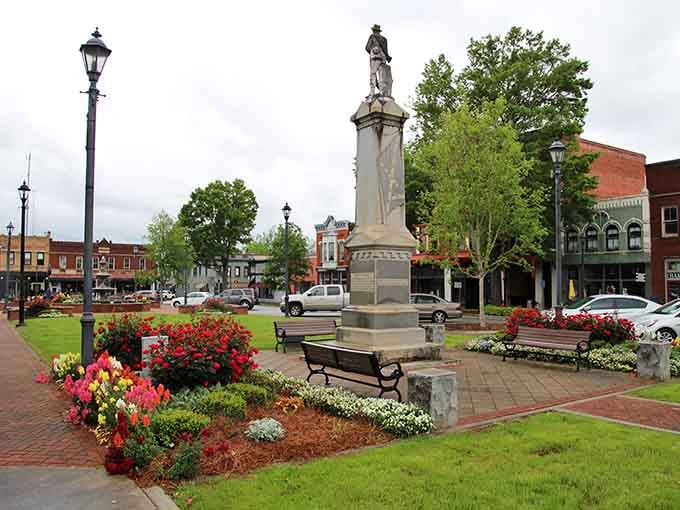 Washington's town square bursts with red and yellow blooms, surrounding a monument that's been watching over this corner of Georgia for generations.