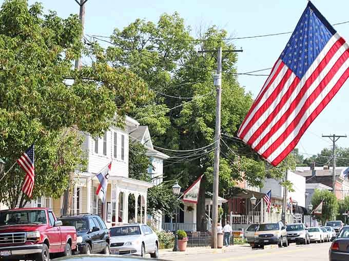 Waynesville's main street stretches out under a gray winter sky, its brick storefronts glowing warm like embers that refuse to go cold.