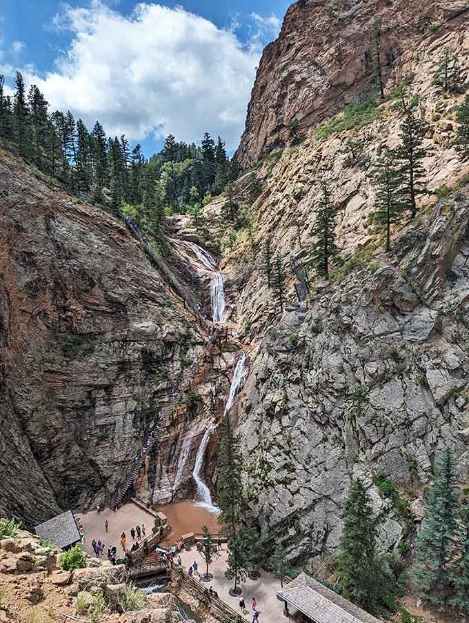 Whitmore Falls drops into a wide, open canyon near Lake City, where the sky is enormous and the silence is absolutely golden.