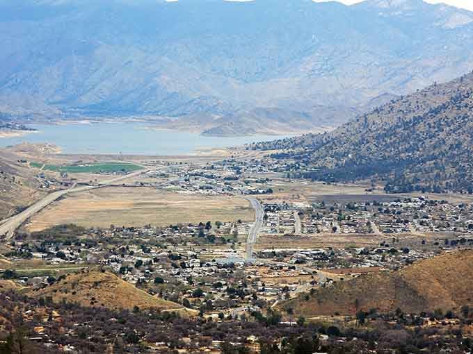 That shimmering lake peeking over Lake Isabella's rooftops is the kind of backyard view that makes realtors smile.