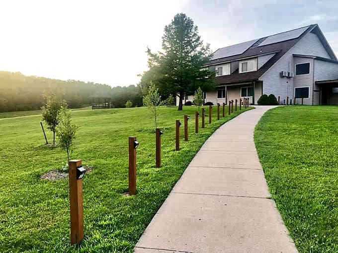 Dewy morning pathways lead through manicured grounds where every step feels like a peaceful meditation.