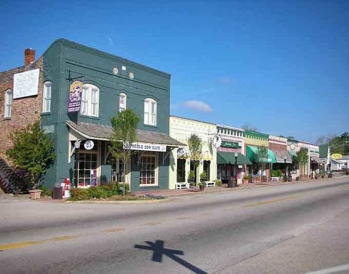 Historic storefronts painted in heritage colors line streets where every building whispers tales of generations who walked these same sidewalks.