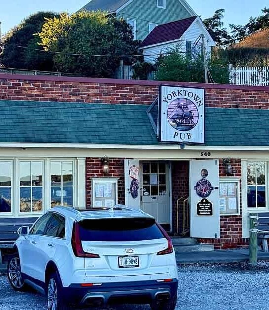 The Crab Cakes At This Virginia Pub Are So Enormous, They Barely Fit On The Plate